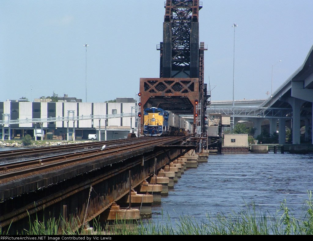 EMDX 75 leading NS 209 across the St.Johns River